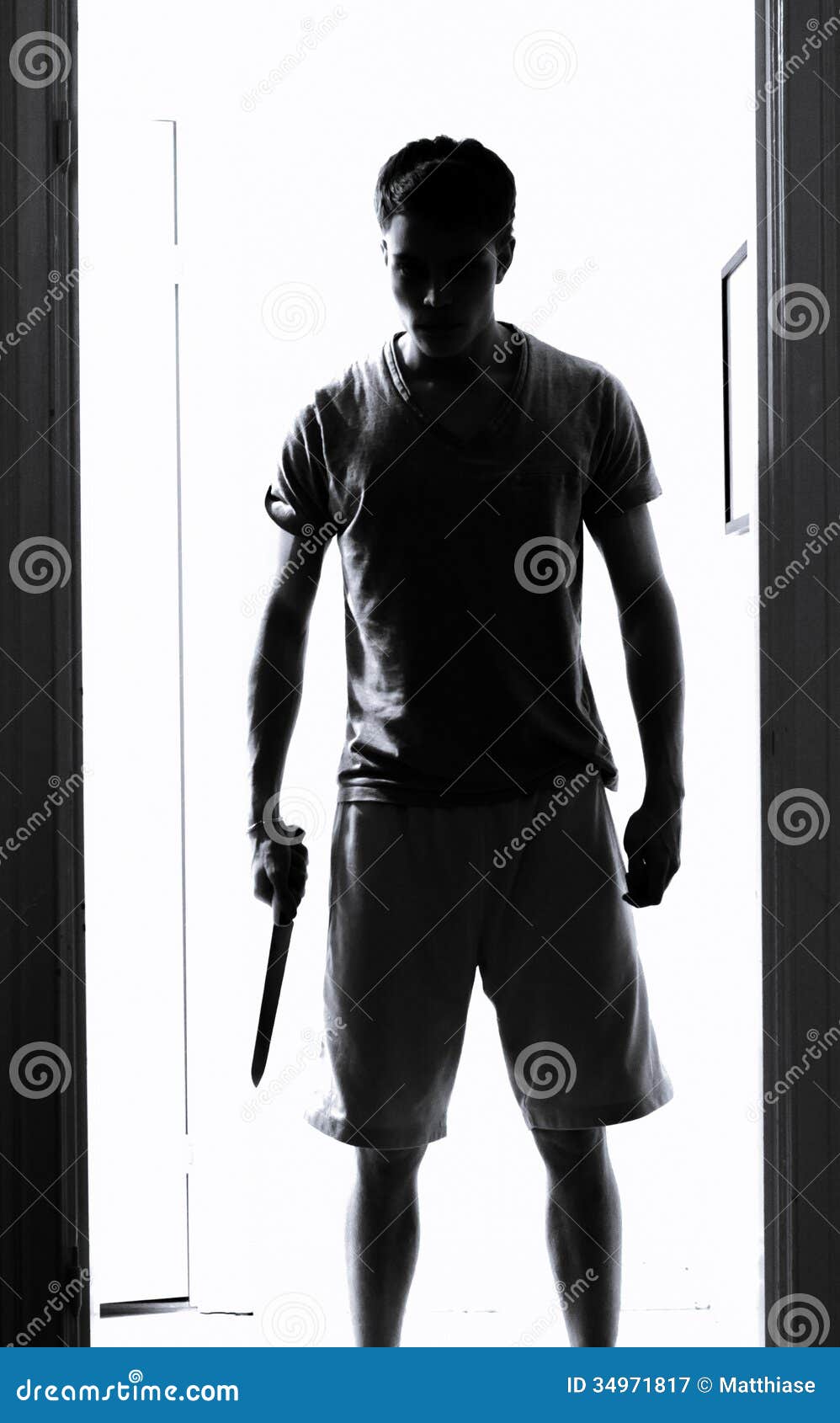 Man Standing With Knife
