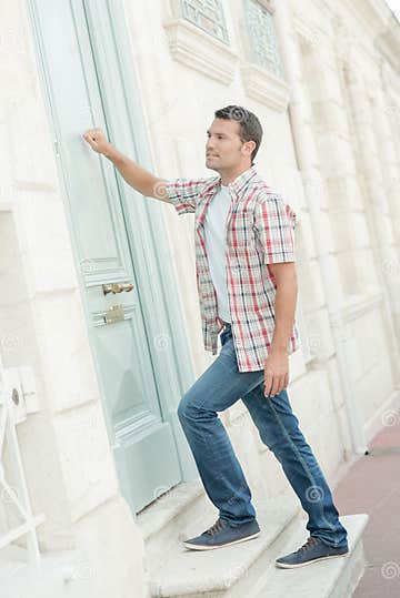 Man Knocking at Door Arrive Stock Photo - Image of front, locked: 104146060