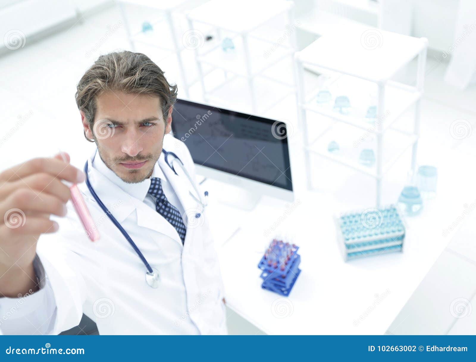 Man in Laboratory Checking Test Tubes Stock Photo - Image of education ...