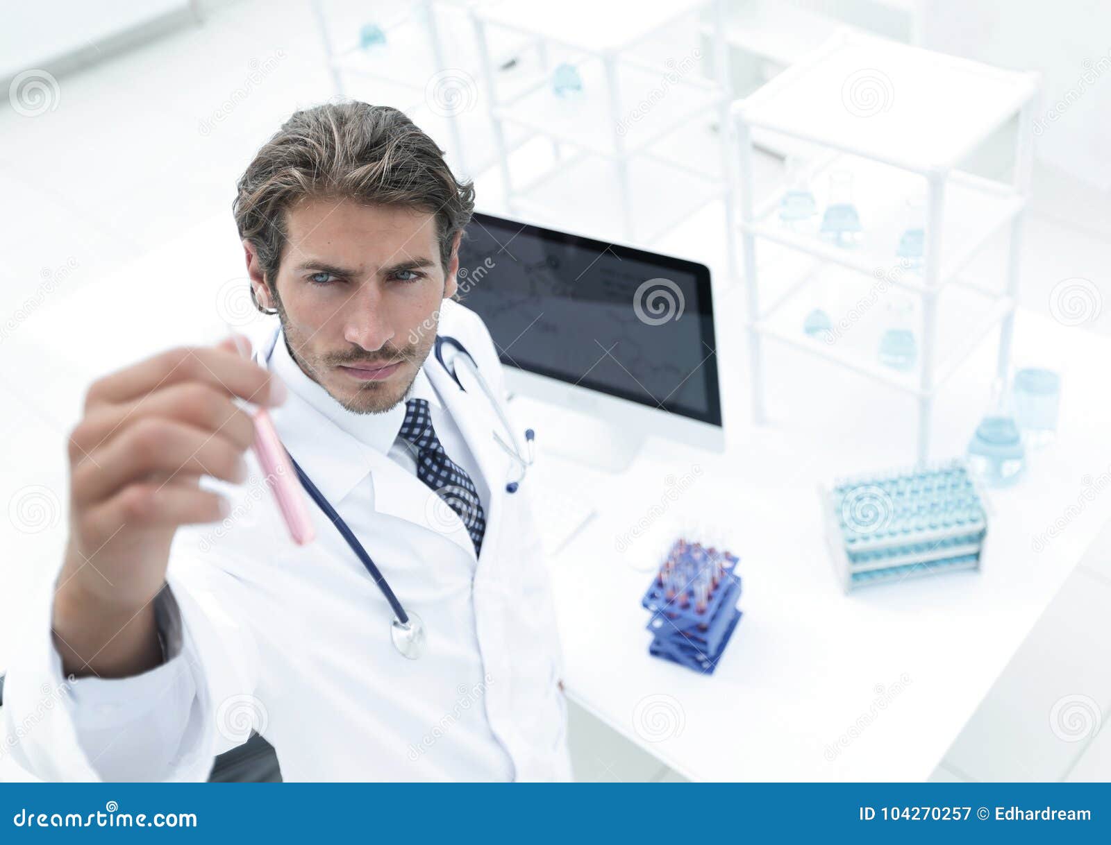 Man in Laboratory Checking Test Tubes Stock Image - Image of chemistry ...