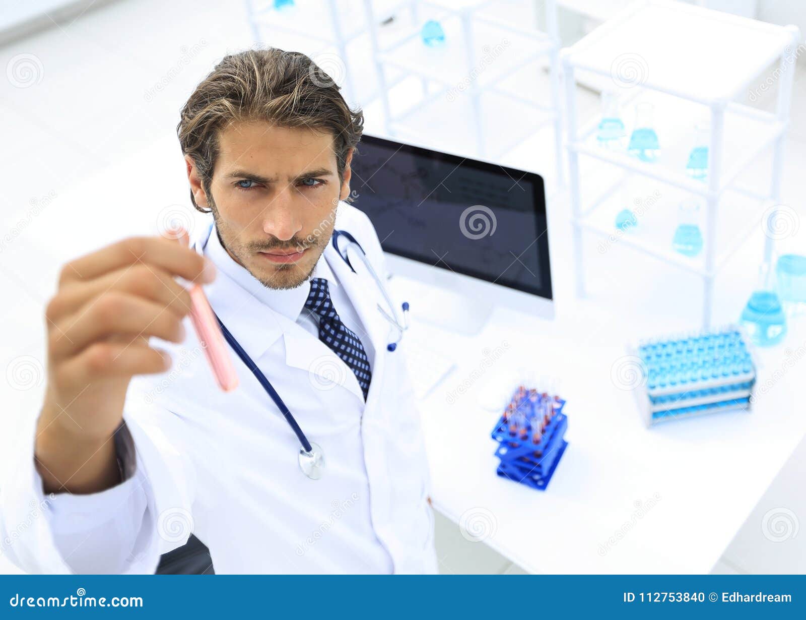 Man in Laboratory Checking Test Tubes Stock Photo - Image of male ...