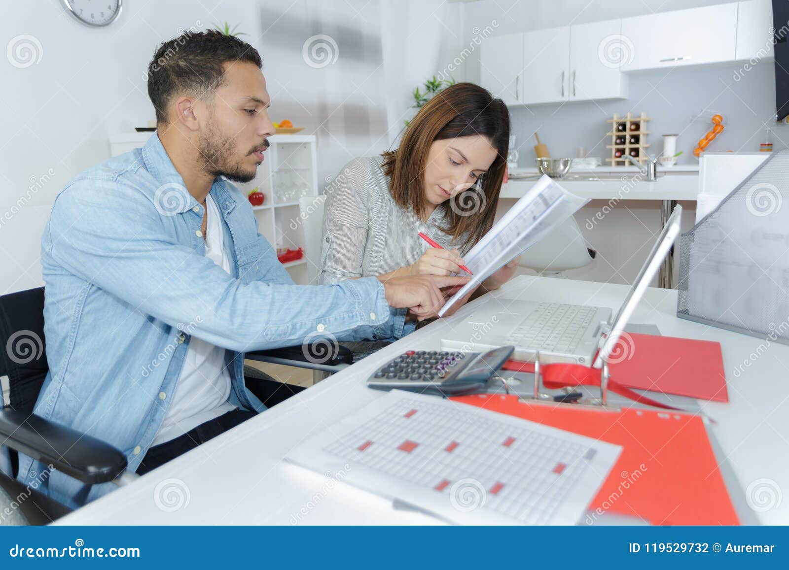 Man and Lady Working on Spreadsheets Stock Photo - Image of schedule ...