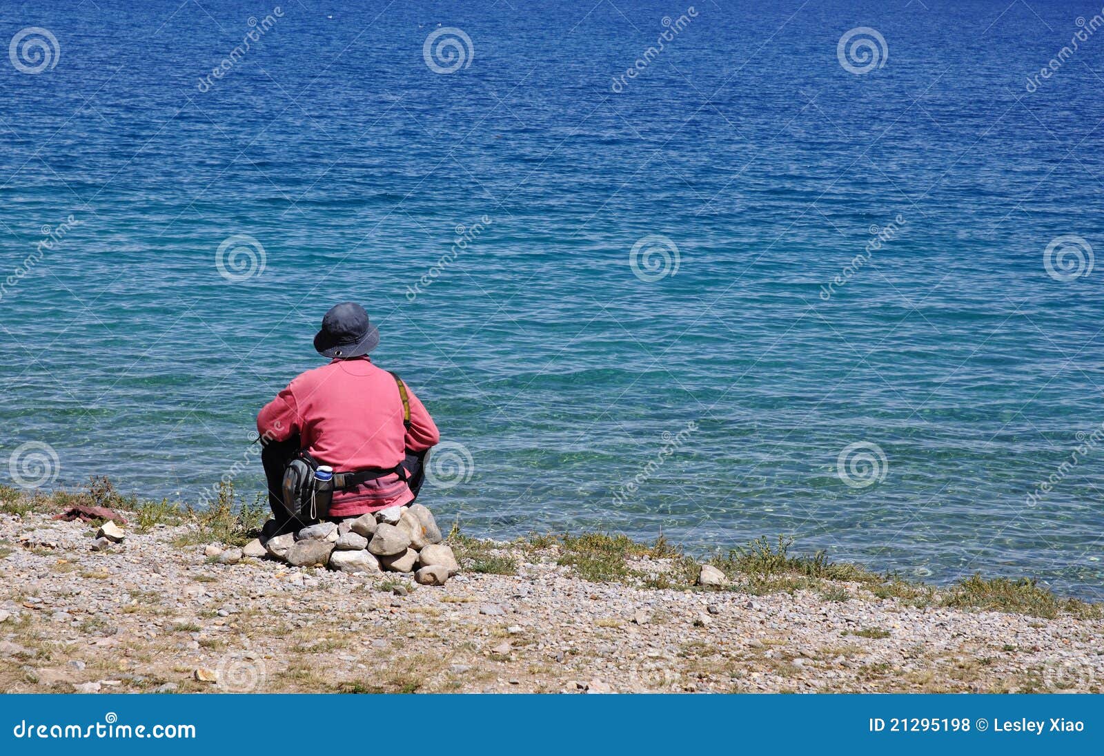 A man at a lake stock photo. Image of shirt, flat, pure - 21295198