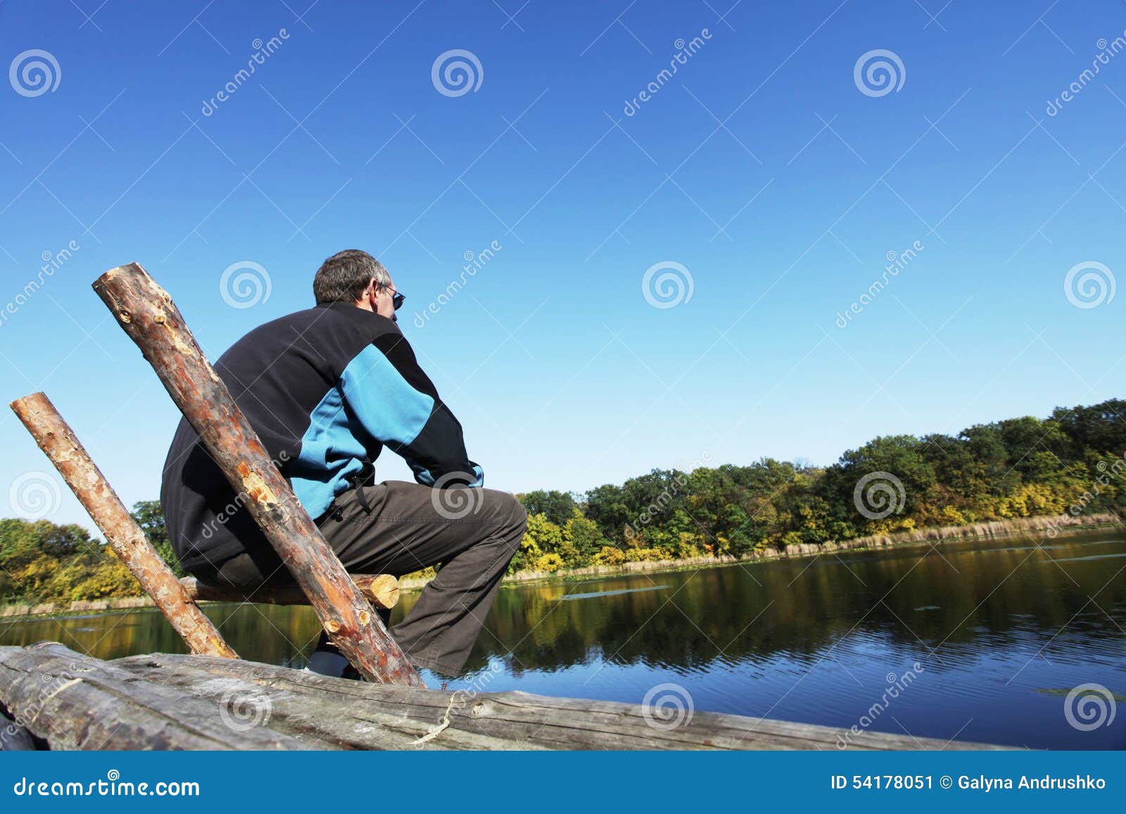 Man on the lake stock image. Image of tourism, nature - 54178051