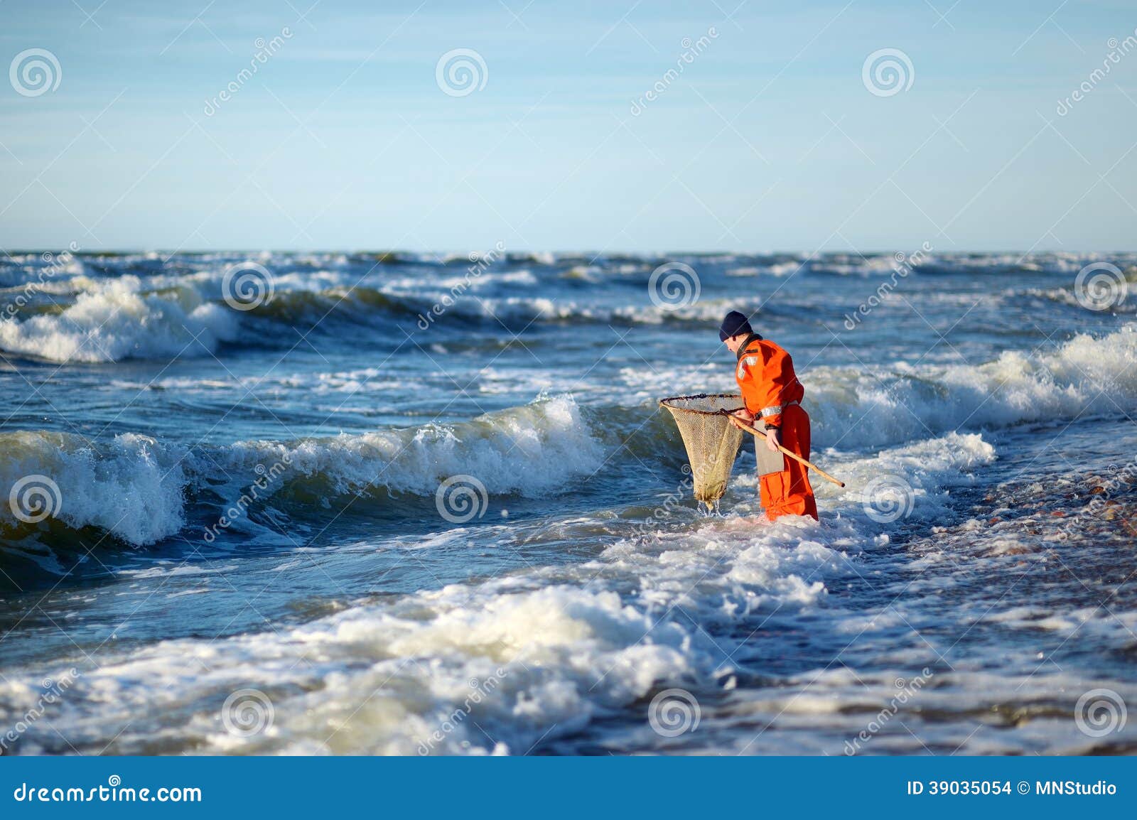 Man with Landing Net Looking for Amber on a Sea Stock Photo - Image of ...