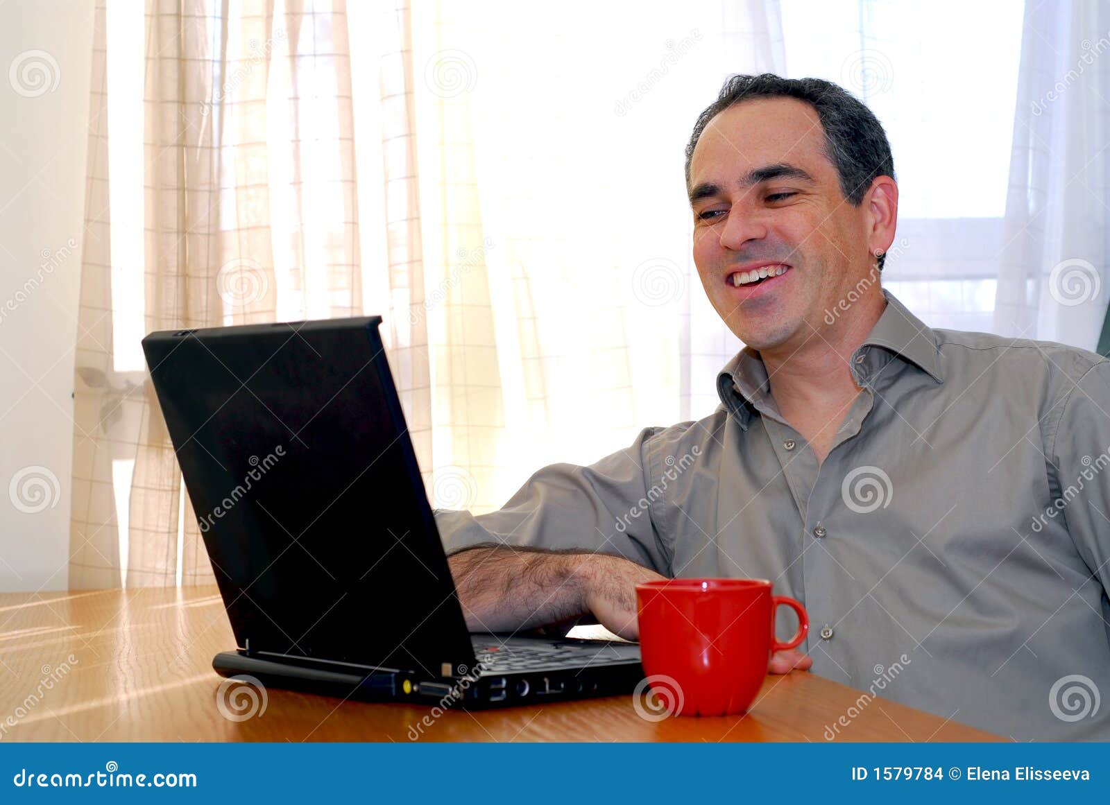 Man with laptop stock photo. Image of notepad, adult, laugh - 1579784