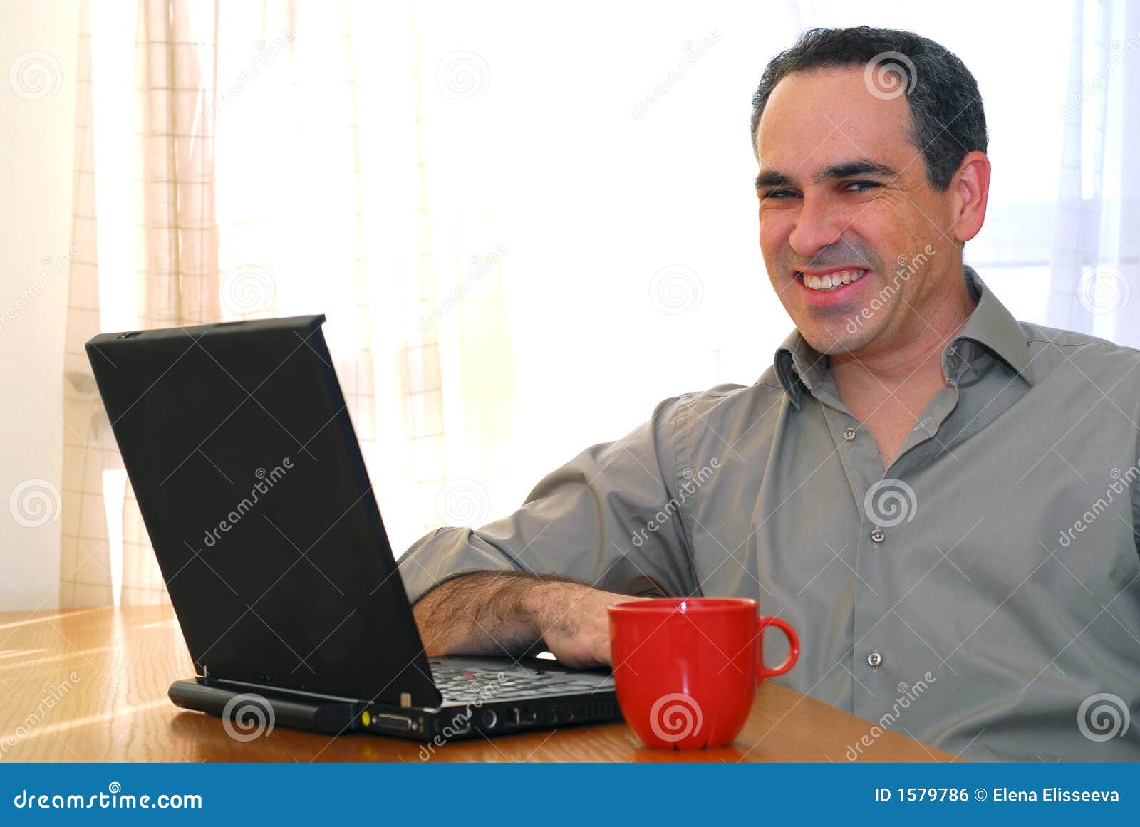 Man with laptop stock photo. Image of coffee, male, finances - 1579786