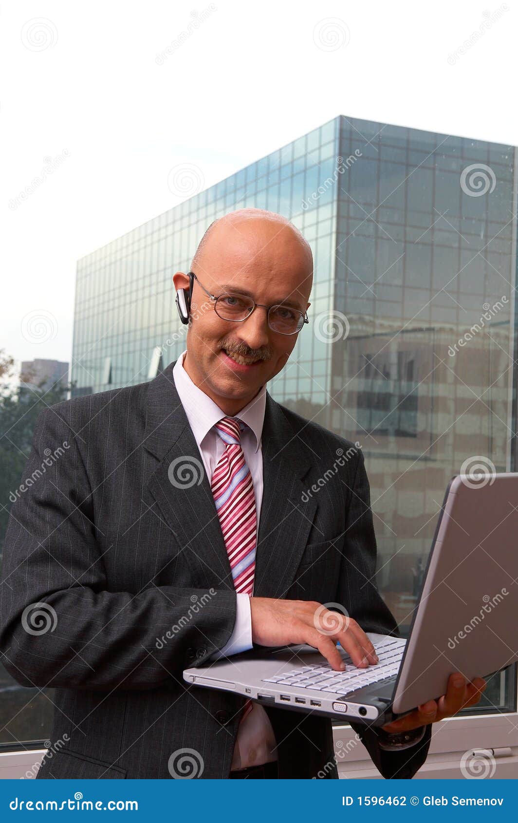 The man with a laptop stock photo. Image of male, chatting - 1596462