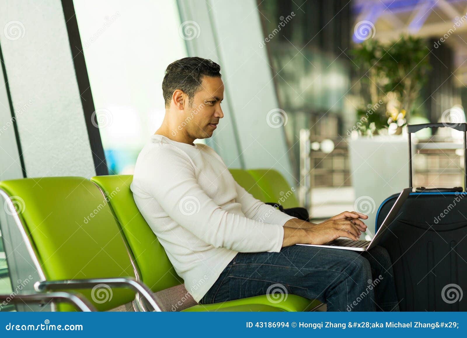 Man laptop airport stock photo. Image of international - 43186994