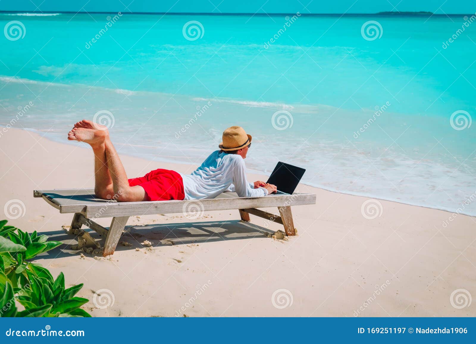 Man with Laptop on Beach Vacation, Remote Work Concept Stock Image ...