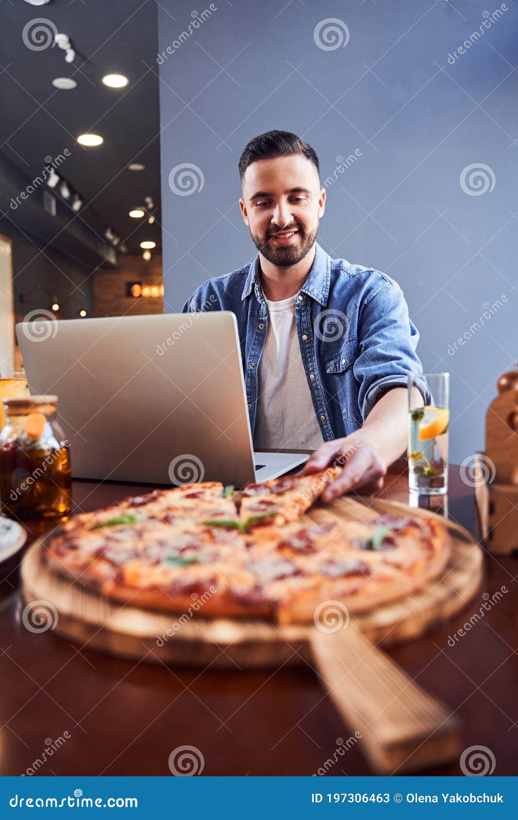 Man with Laptop in Eating Pizza at Workplace Stock Image - Image of ...