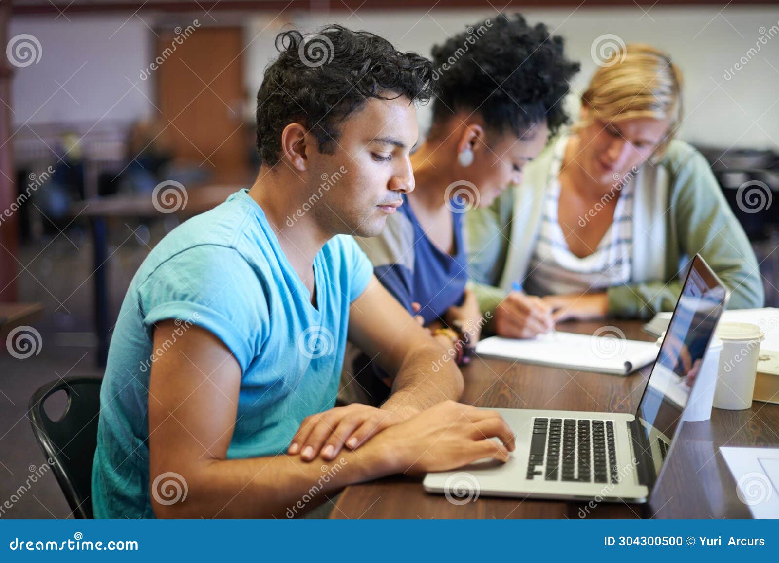 Man, Laptop or Group of Students Studying in University, College or ...