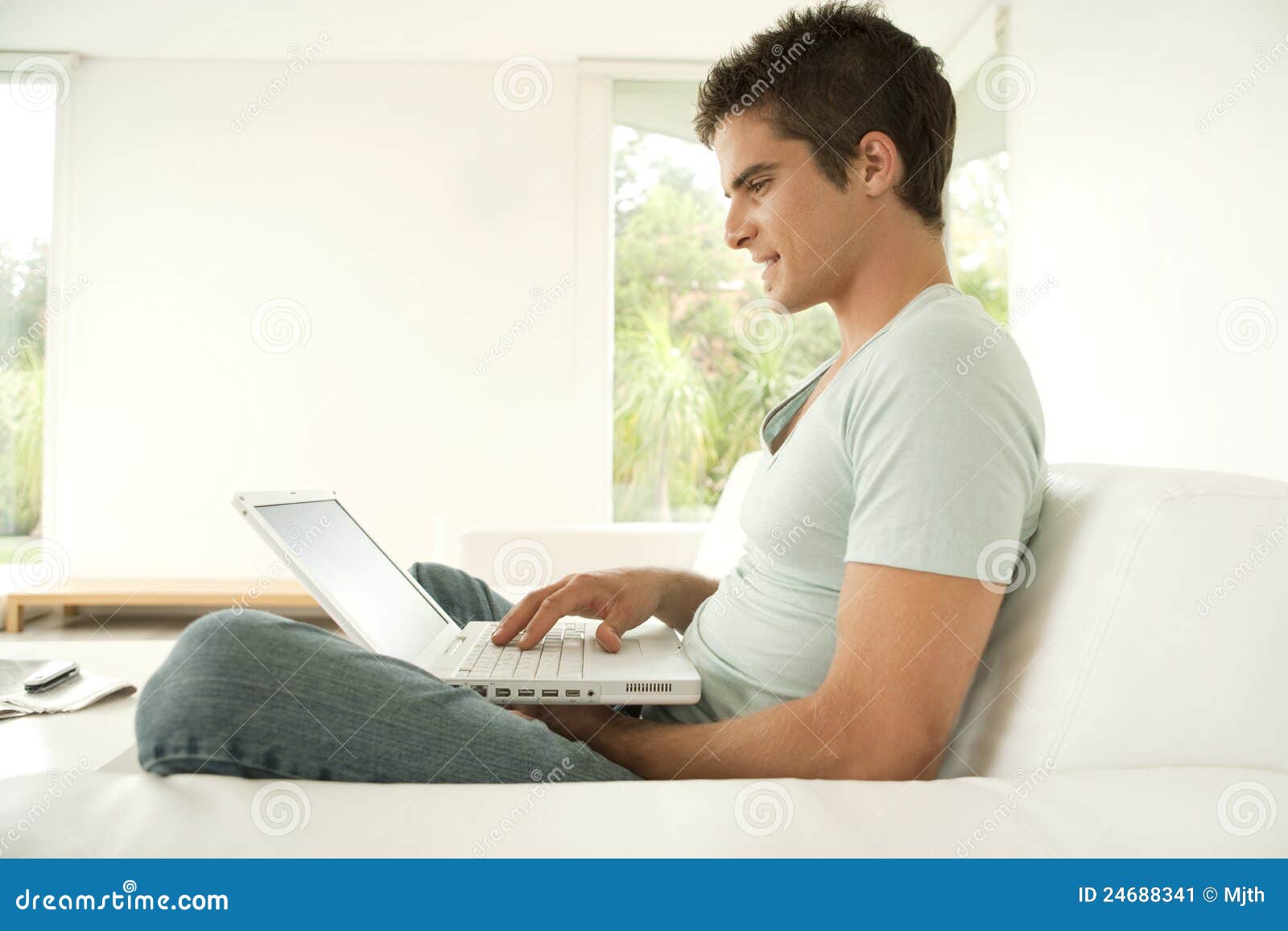 Man with Laptop at Home stock image. Image of keyboard - 24688341