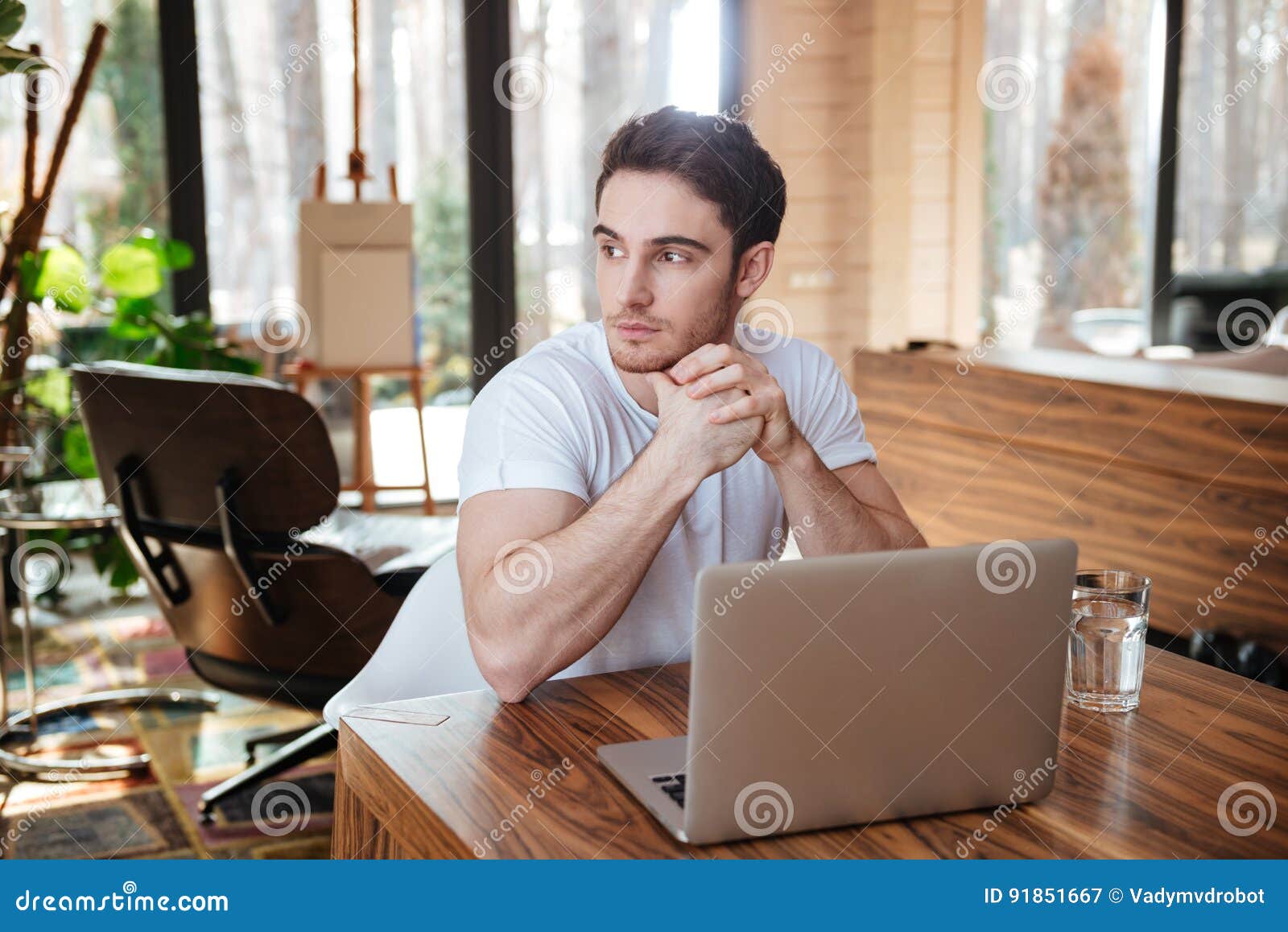Man with Laptop Looking Away Stock Image - Image of room, business ...