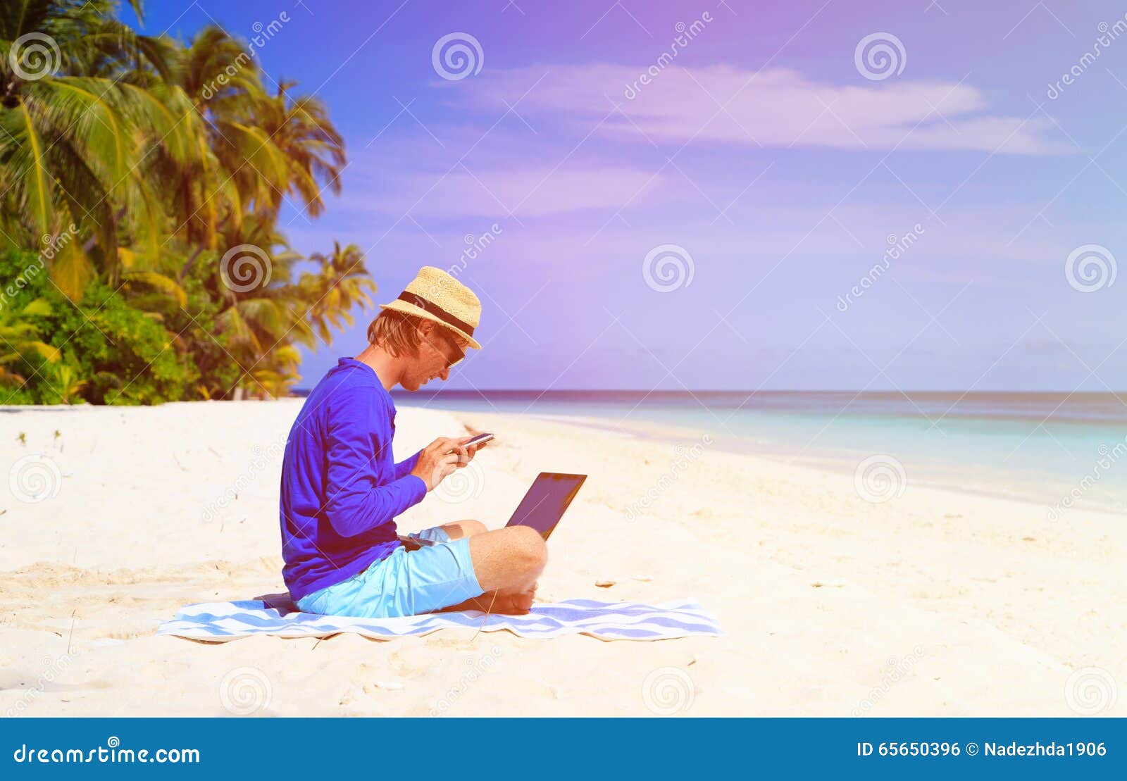Man with Laptop and Mobile Phone on Tropical Beach Stock Photo - Image ...