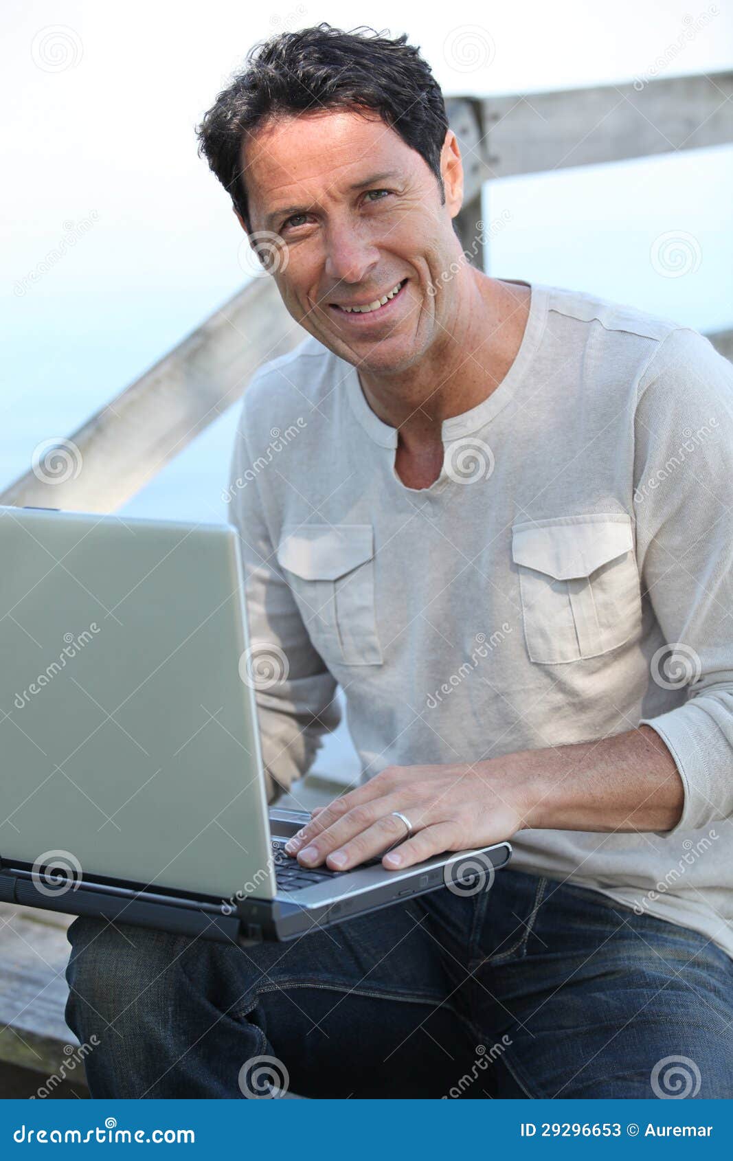 Man on laptop outside stock image. Image of sitting, frontview - 29296653