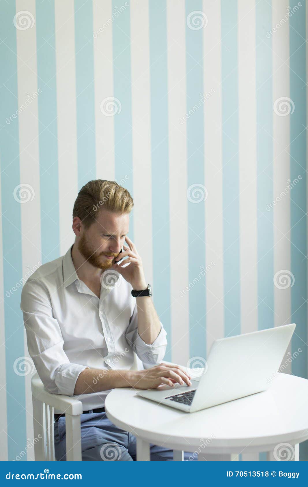 Man with a Laptop and a Phone Stock Photo - Image of notebook, home ...