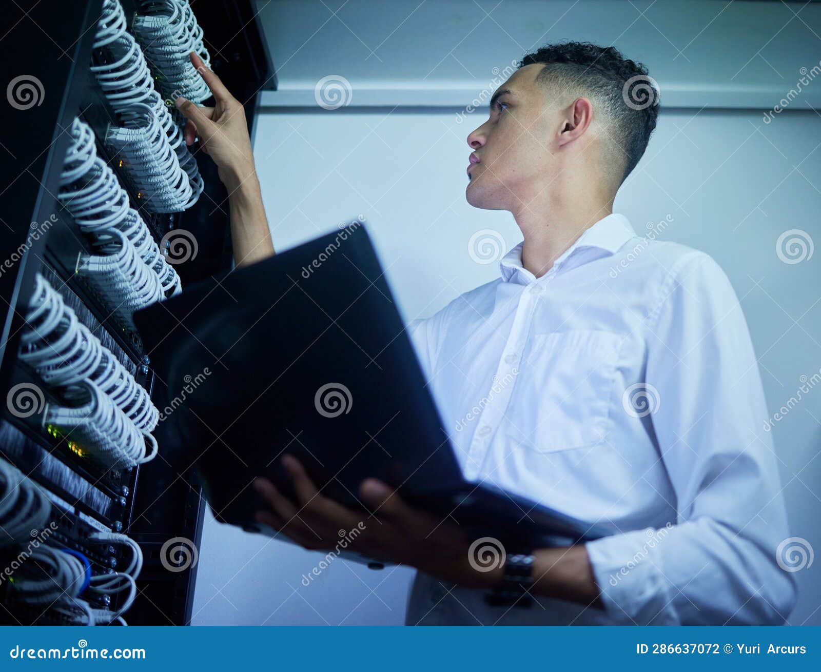 Man, Laptop and Technician Work on Server Room, Data Center or Database ...