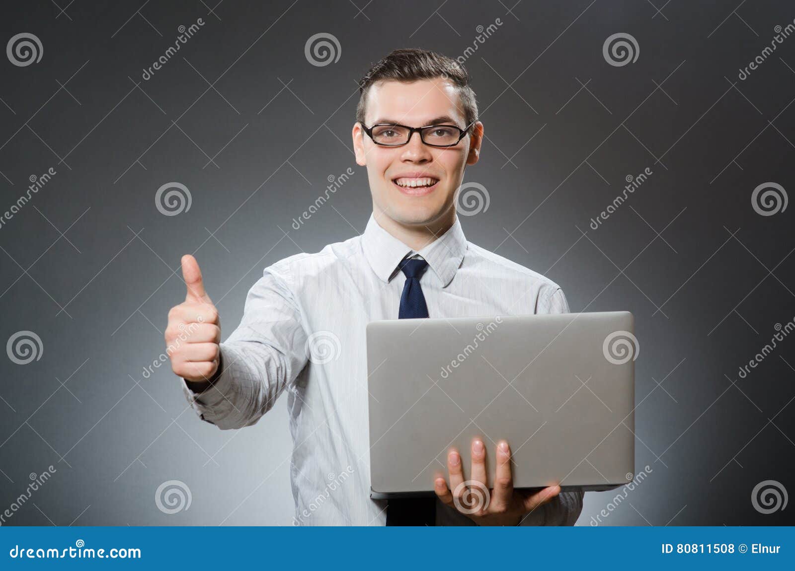 The Man with Laptop and Thumbs Up Stock Photo - Image of executive ...