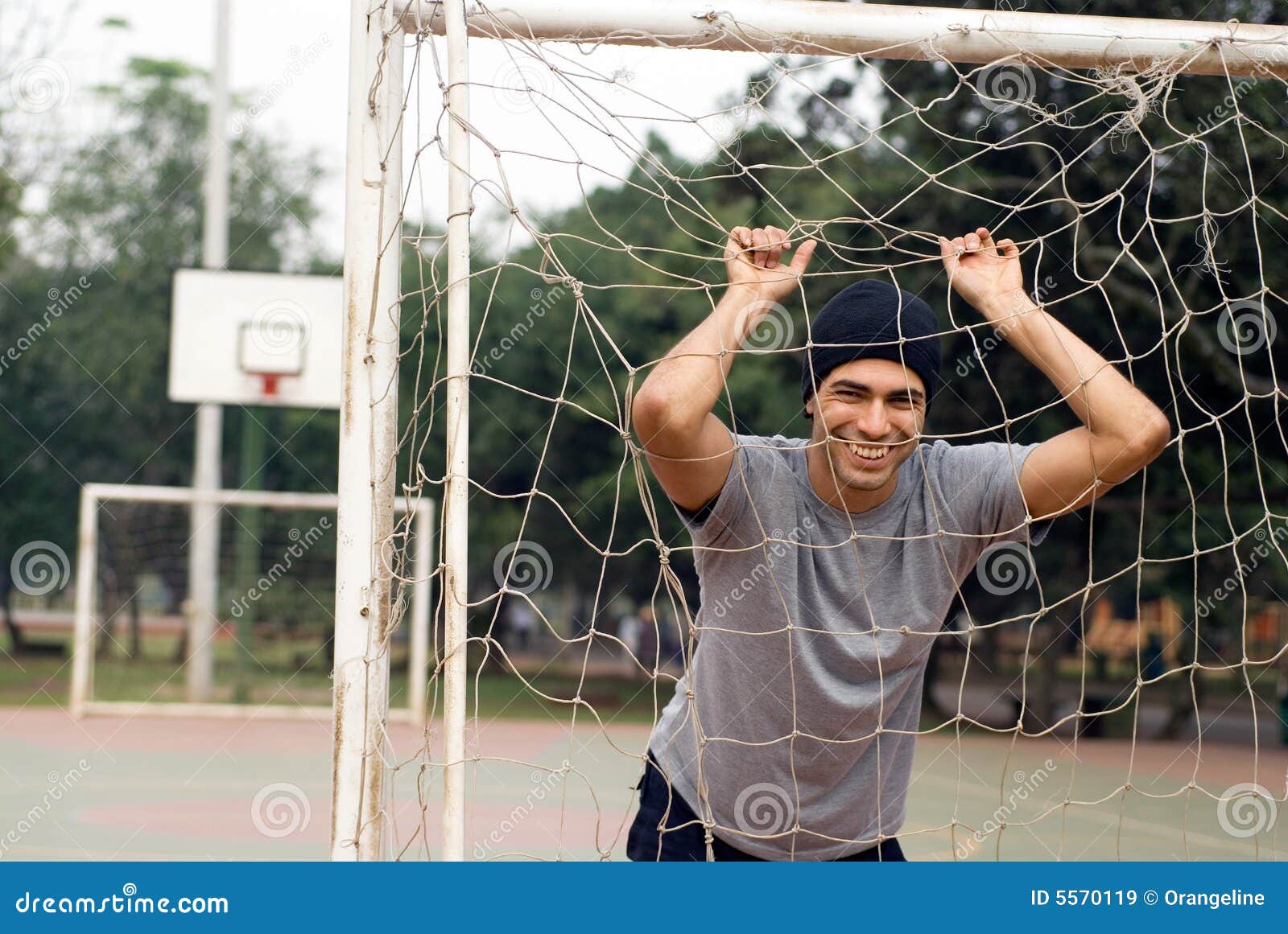 Man Laughing with Net- Horizontal Stock Image - Image of mixed, court ...