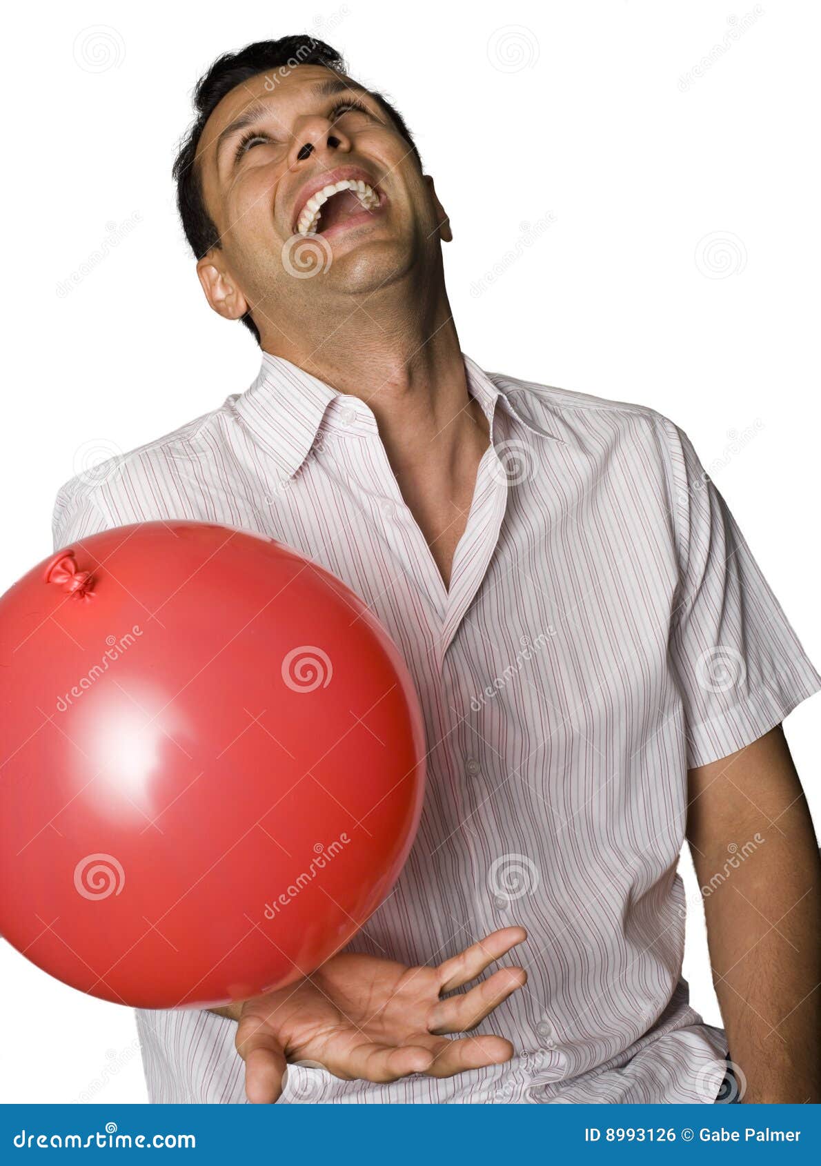 Man Laughing and Playing with Baloon Stock Photo - Image of pleased ...