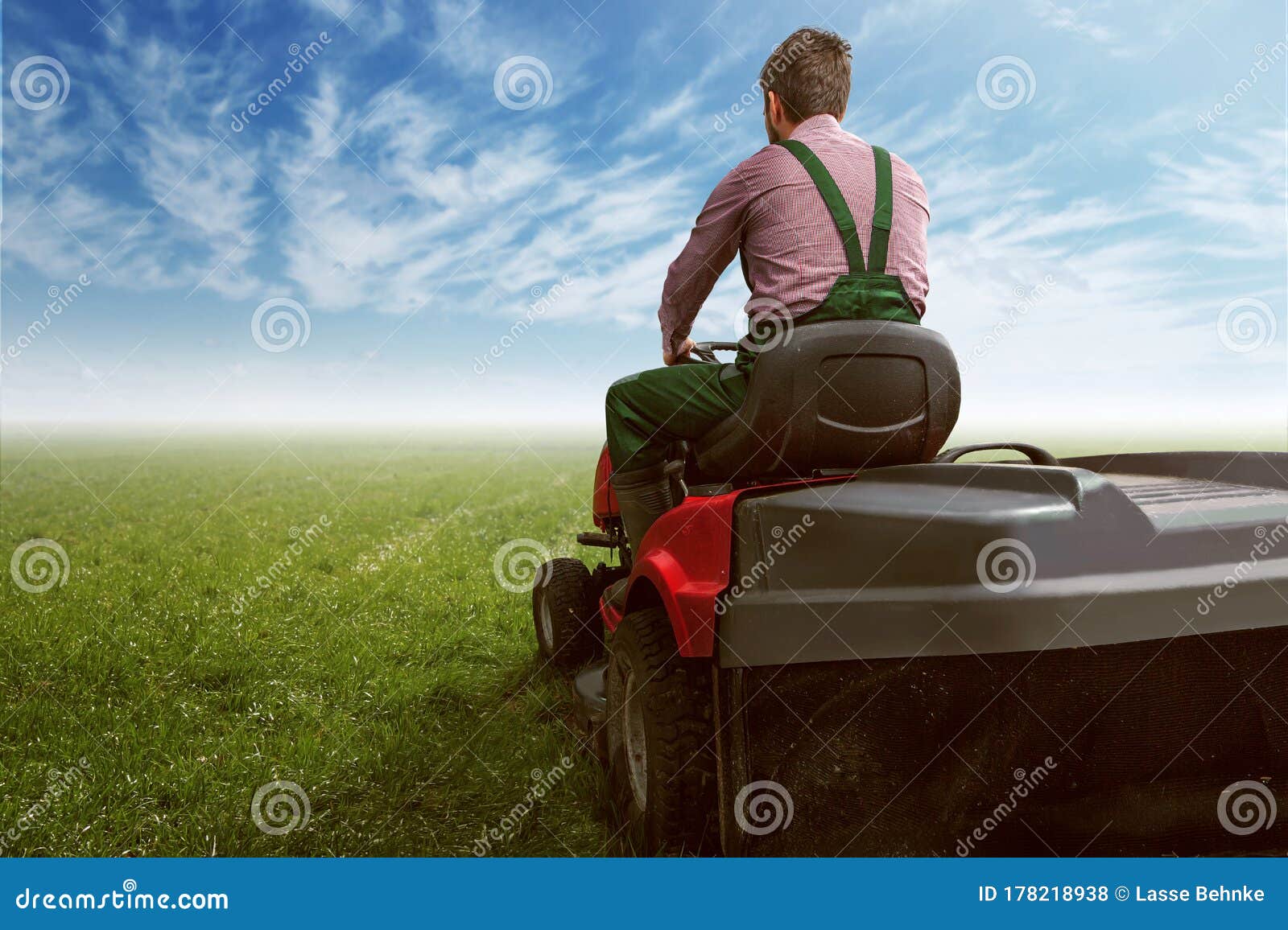 Man on a lawn tractor stock photo. Image of infinite - 178218938