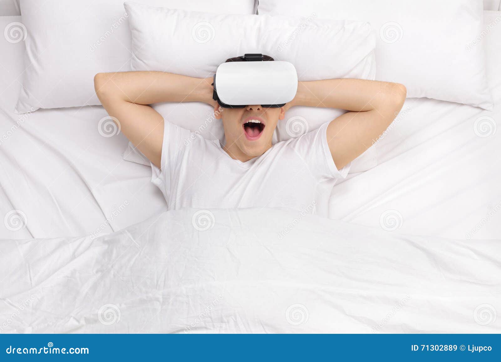 Man Laying on Bed and Using VR Goggles Stock Image - Image of caucasian ...