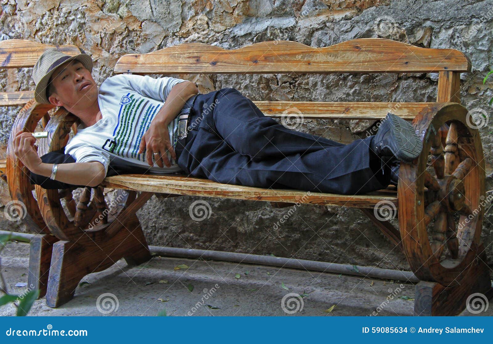 Man is Laying on the Bench in Lijiang, China Editorial Stock Image ...
