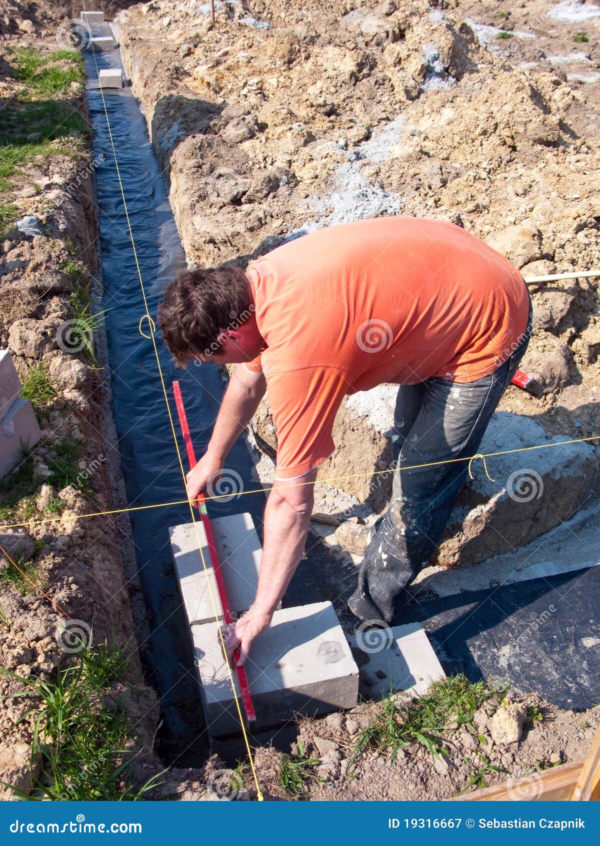 Man Laying Building Foundation Stock Image - Image of footings ...