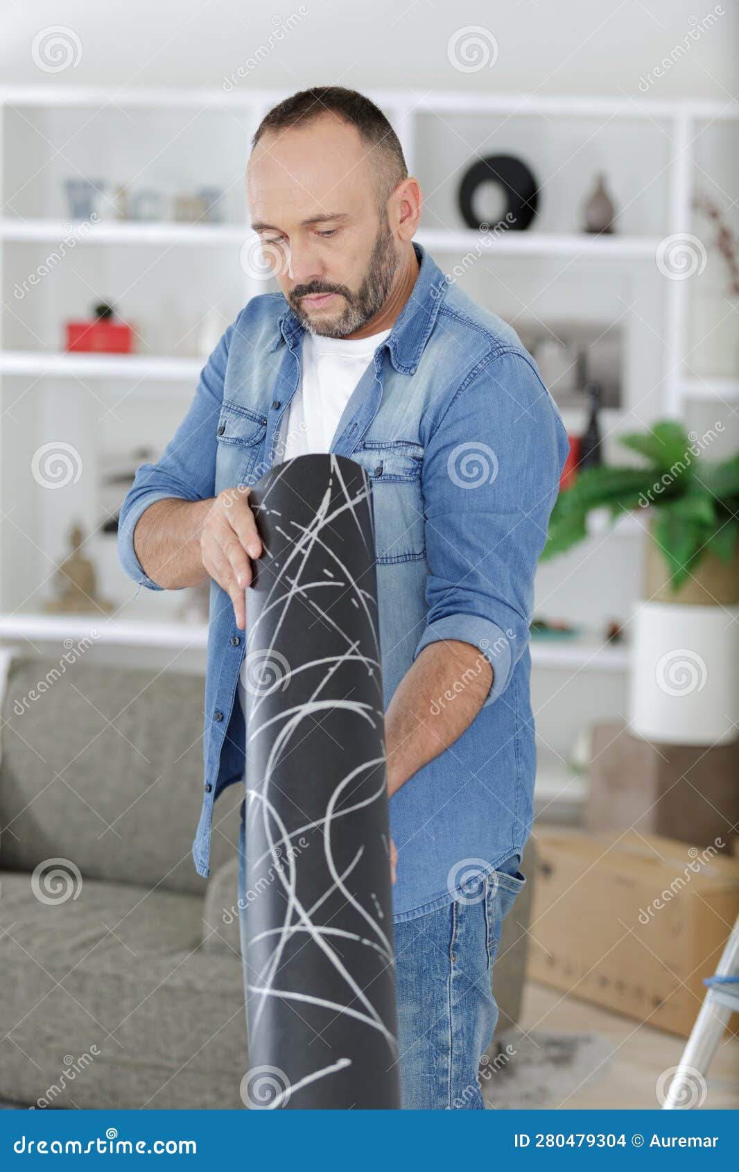 Man laying carpet stock photo. Image of manual, plan - 280479304