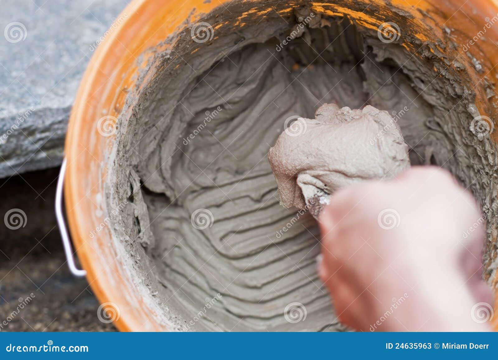 Man Laying on Cement Mixed in a Bucket Stock Image - Image of rustic ...