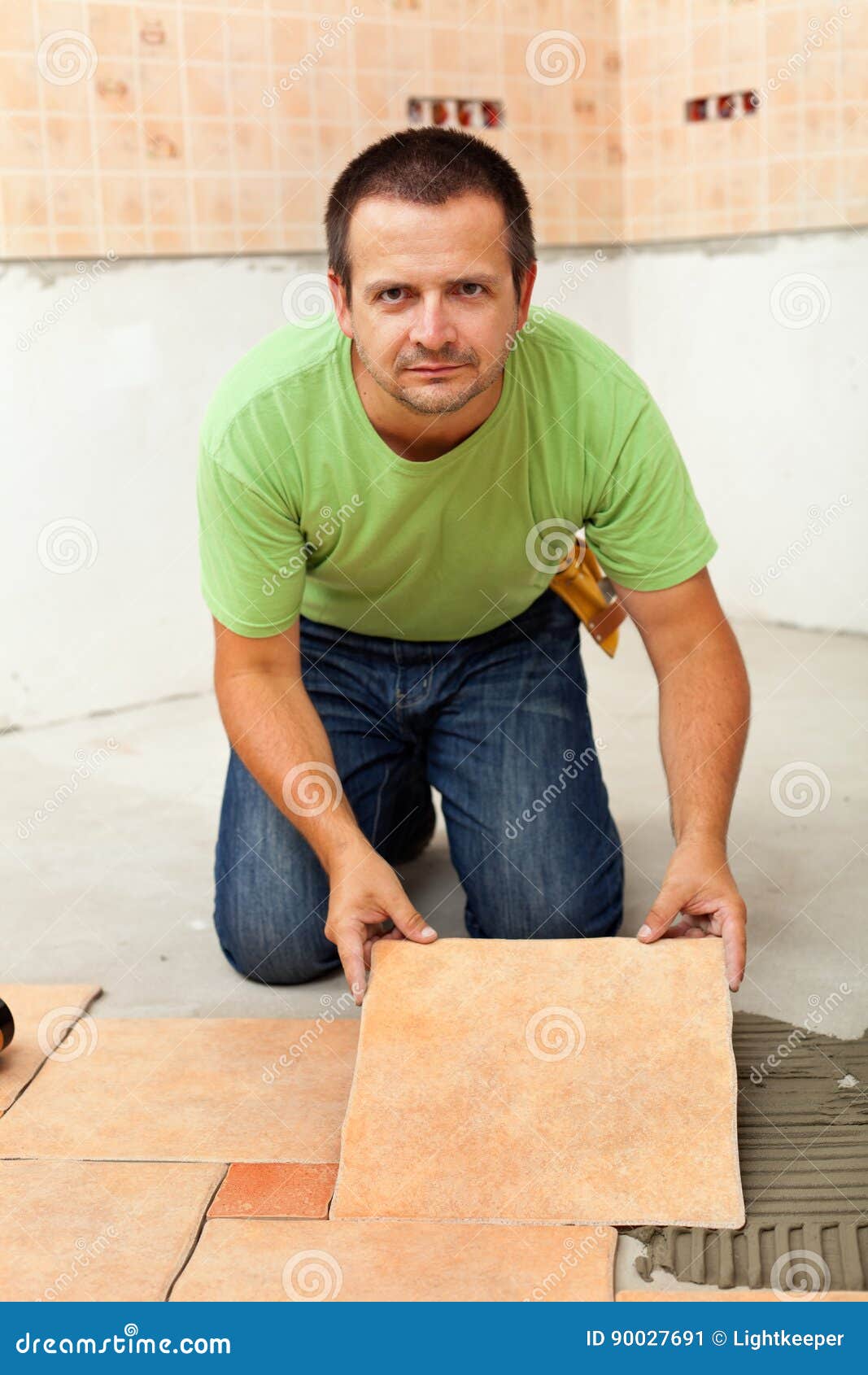 Man Laying Ceramic Floor Tiles Stock Image - Image of hands ...