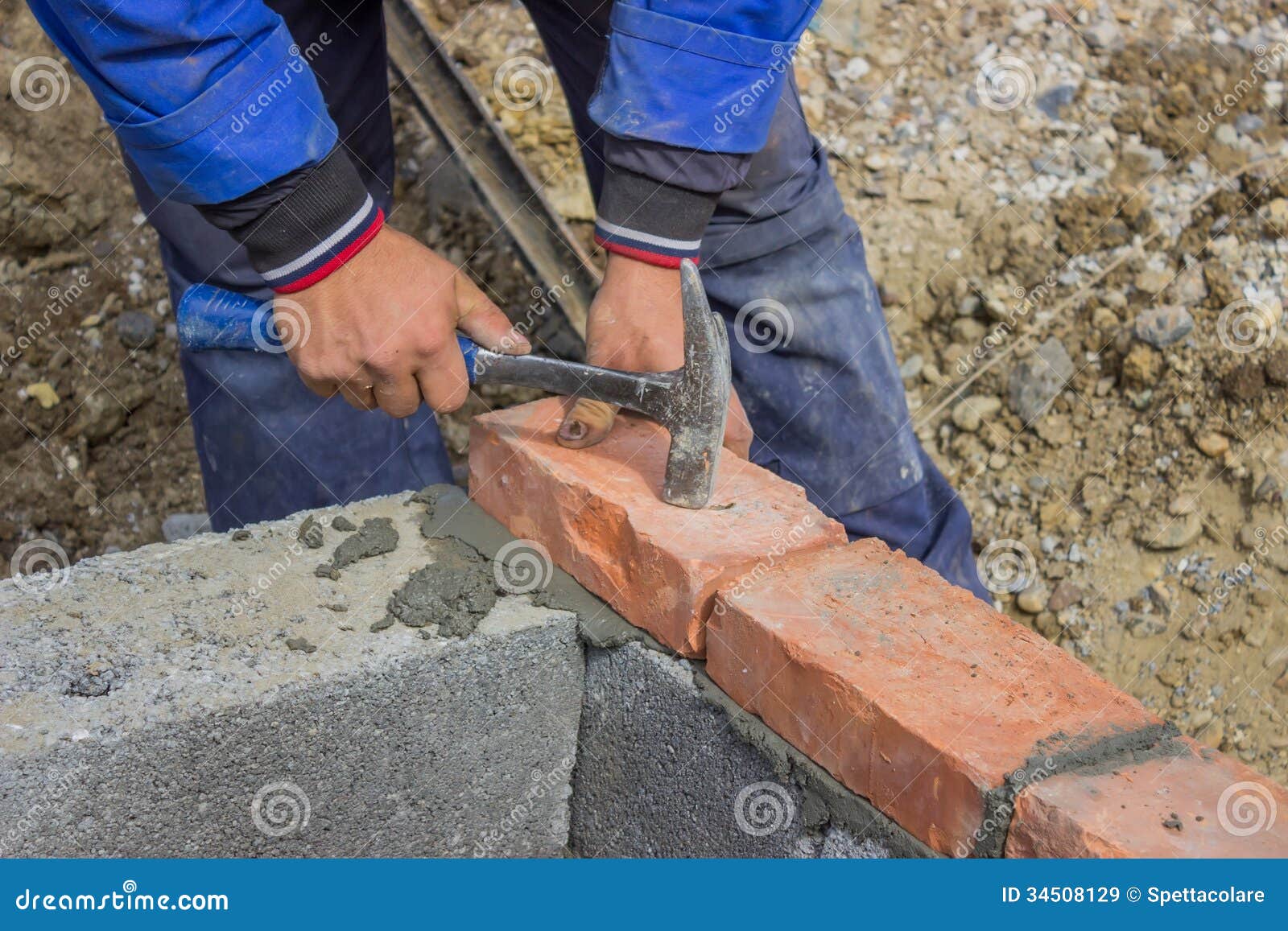 Man Laying Concrete Block and Bricks Wall Stock Image - Image of ...