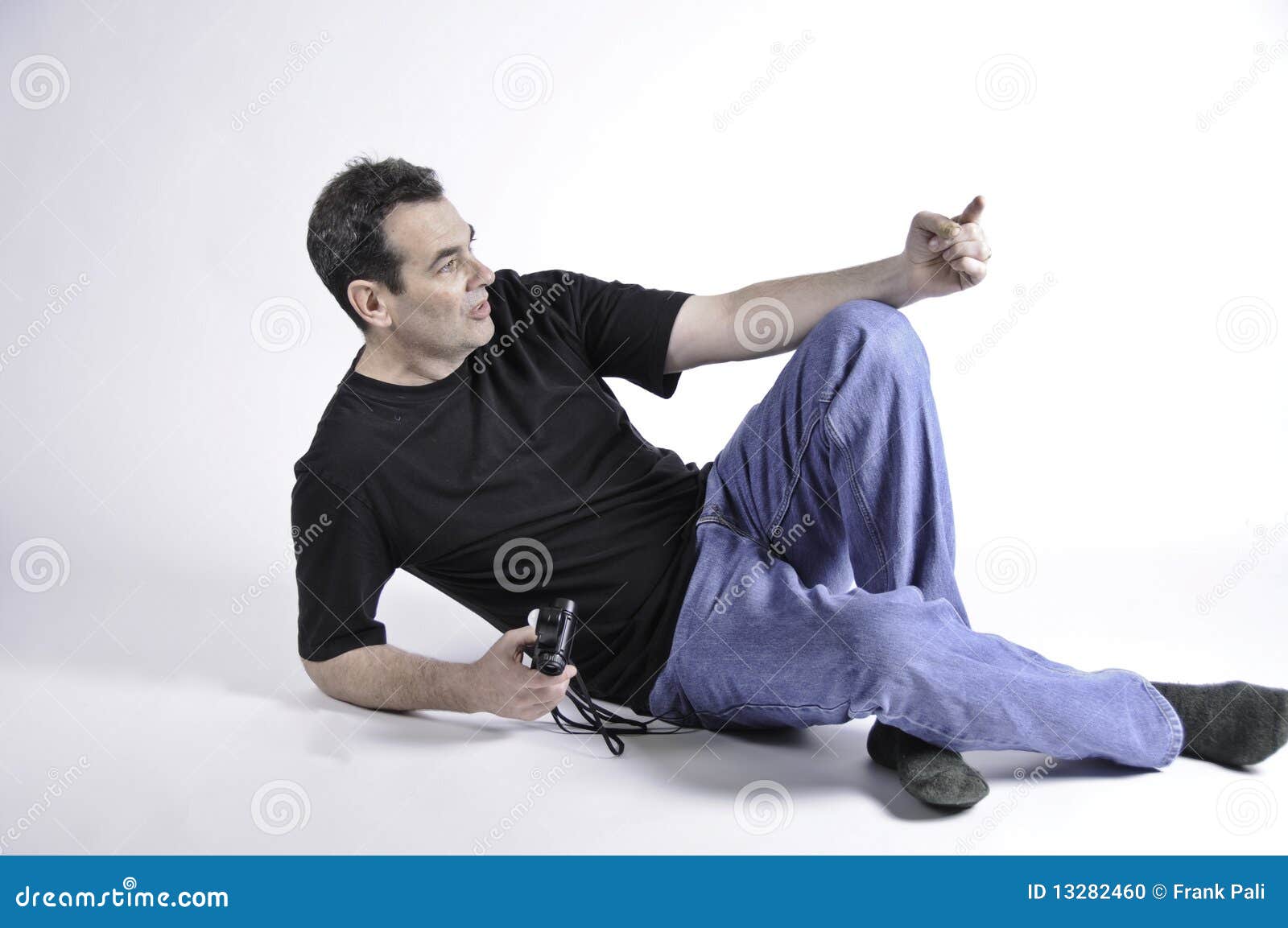 Man Laying on the Floor and Pointing Stock Photo - Image of stitch ...