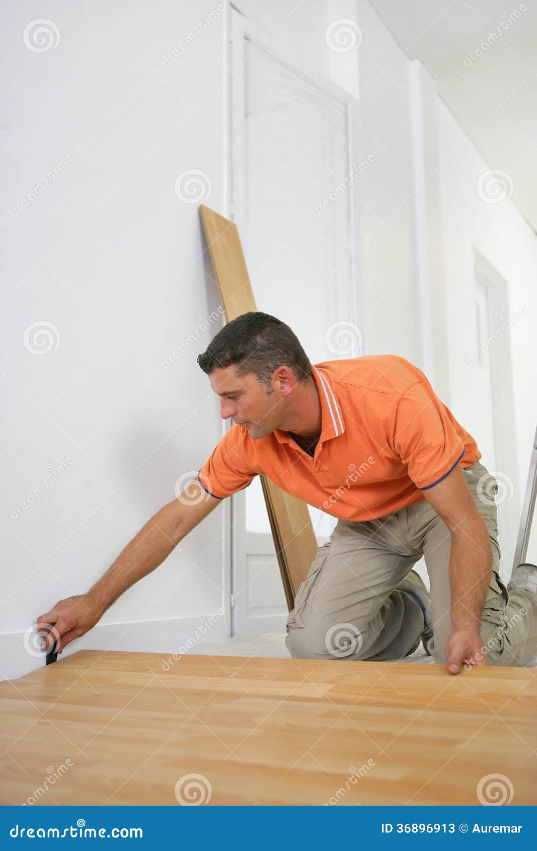Man laying a floor stock image. Image of indoor, expert - 36896913