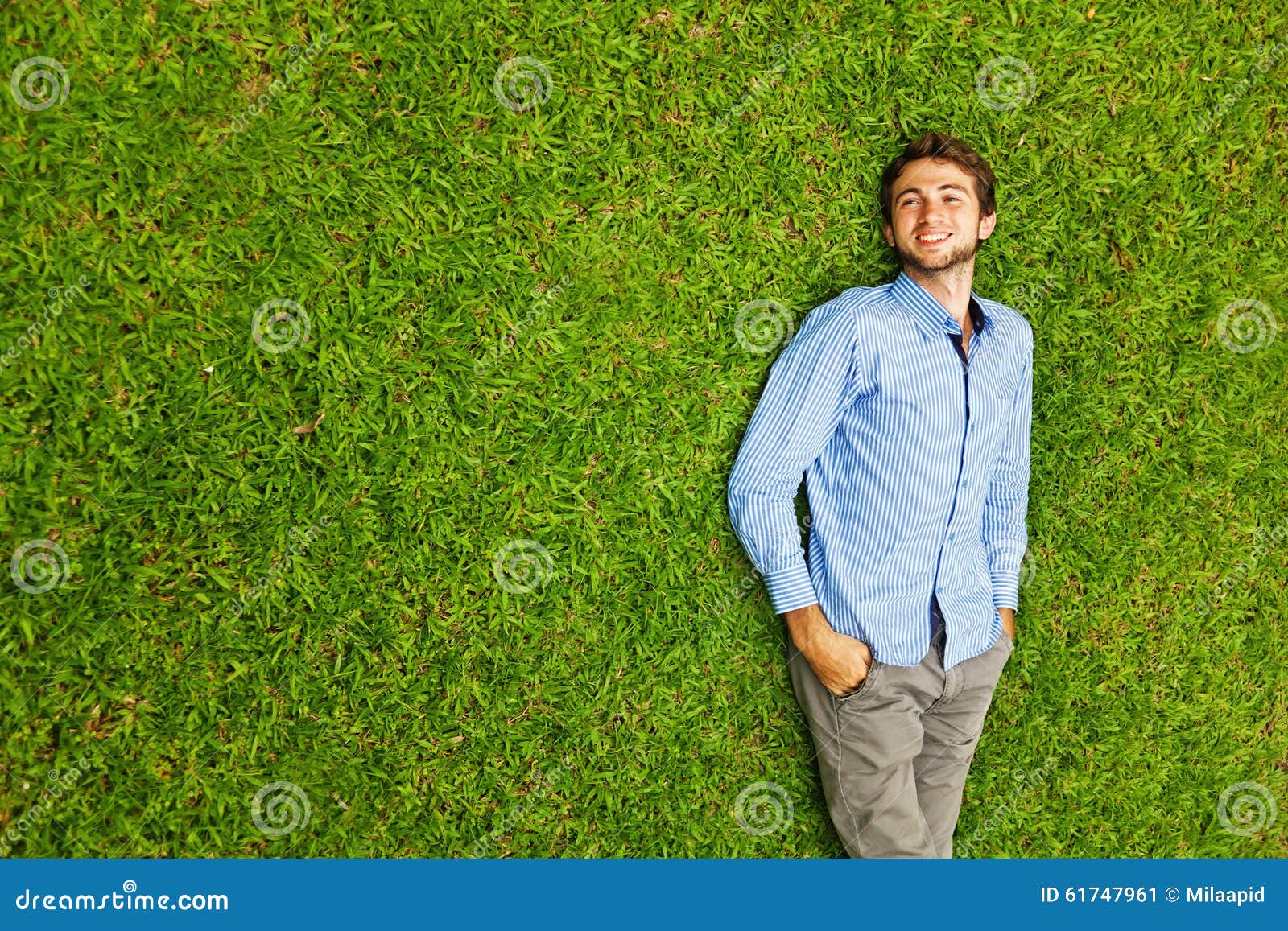 Man laying on a grass stock image. Image of freedom, outdoor - 61747961