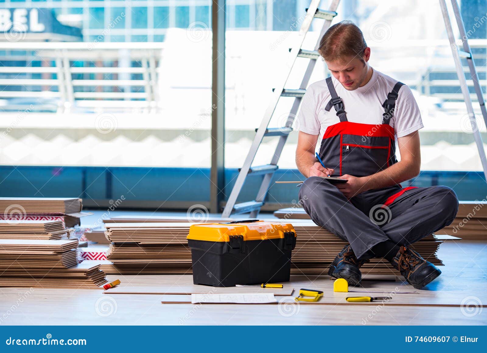 The Man Laying Laminate Flooring in Construction Concept Stock Image ...