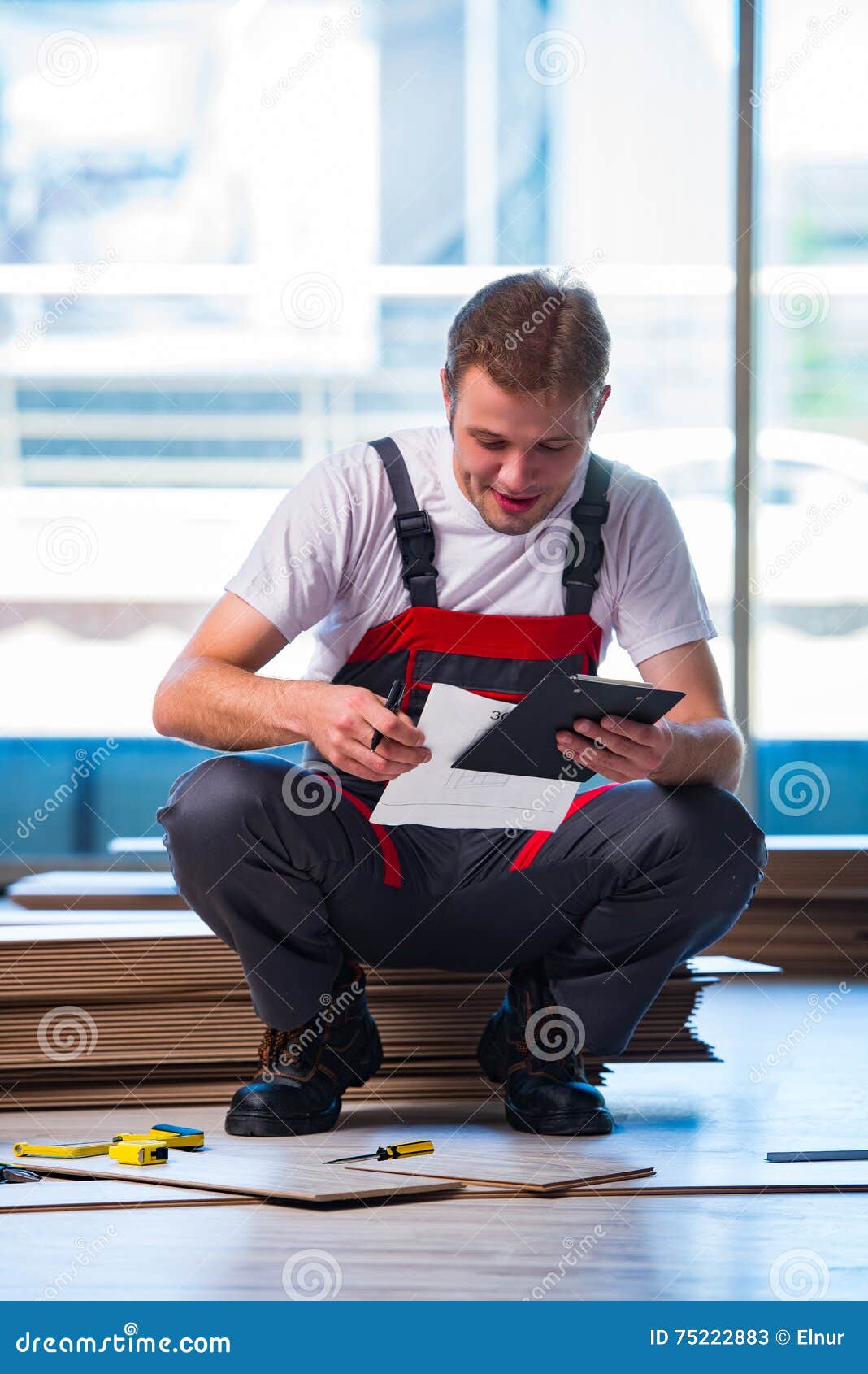 The Man Laying Laminate Flooring in Construction Concept Stock Image ...