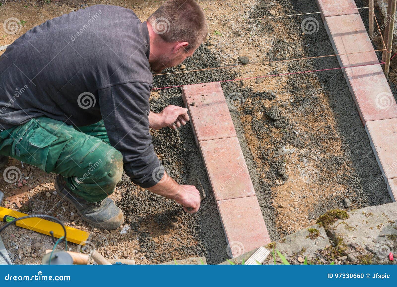 Man is Laying Paving Stones. Stock Photo - Image of crafts, building ...