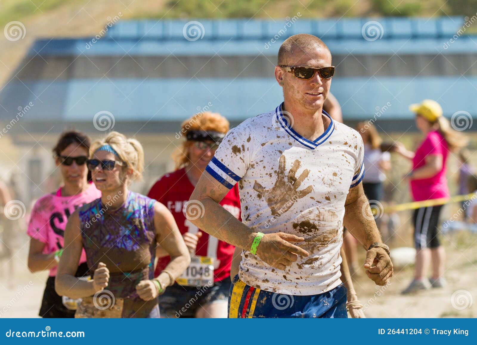 Man Leading the Pack at a Mud Race. Editorial Stock Image - Image of ...