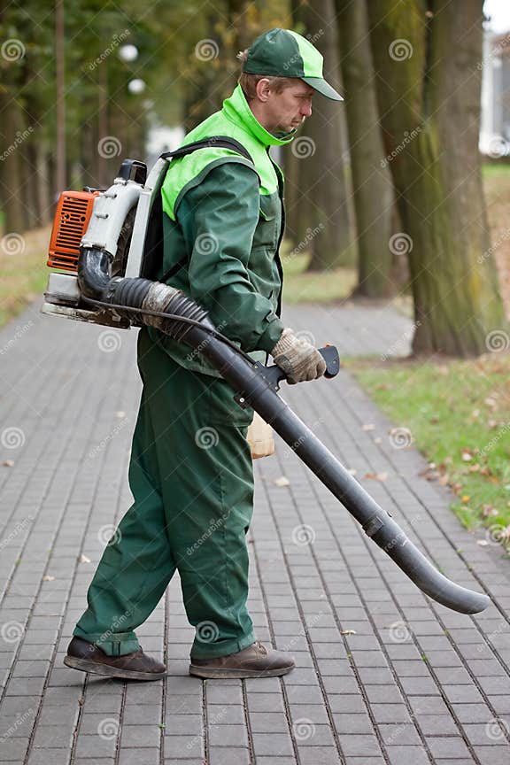 Man with leaf blower stock image. Image of maintenance - 21490185