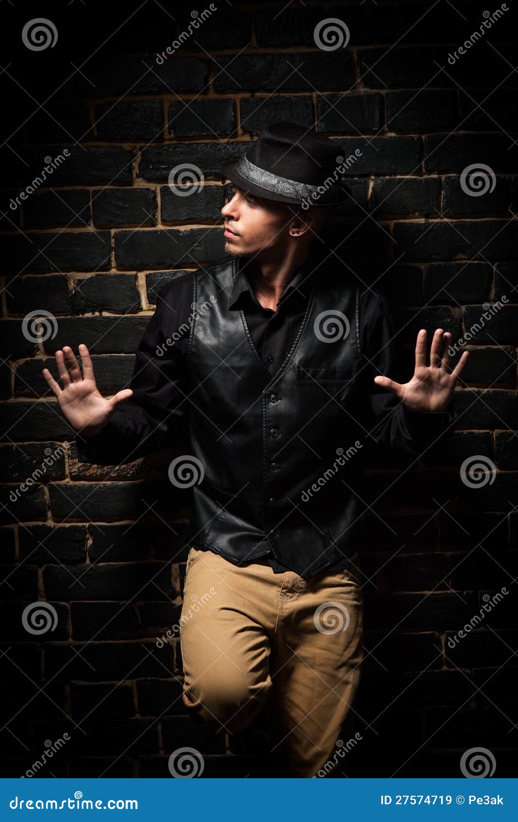 Man Lean Against Black Brick Wall Stock Image - Image of ambient ...