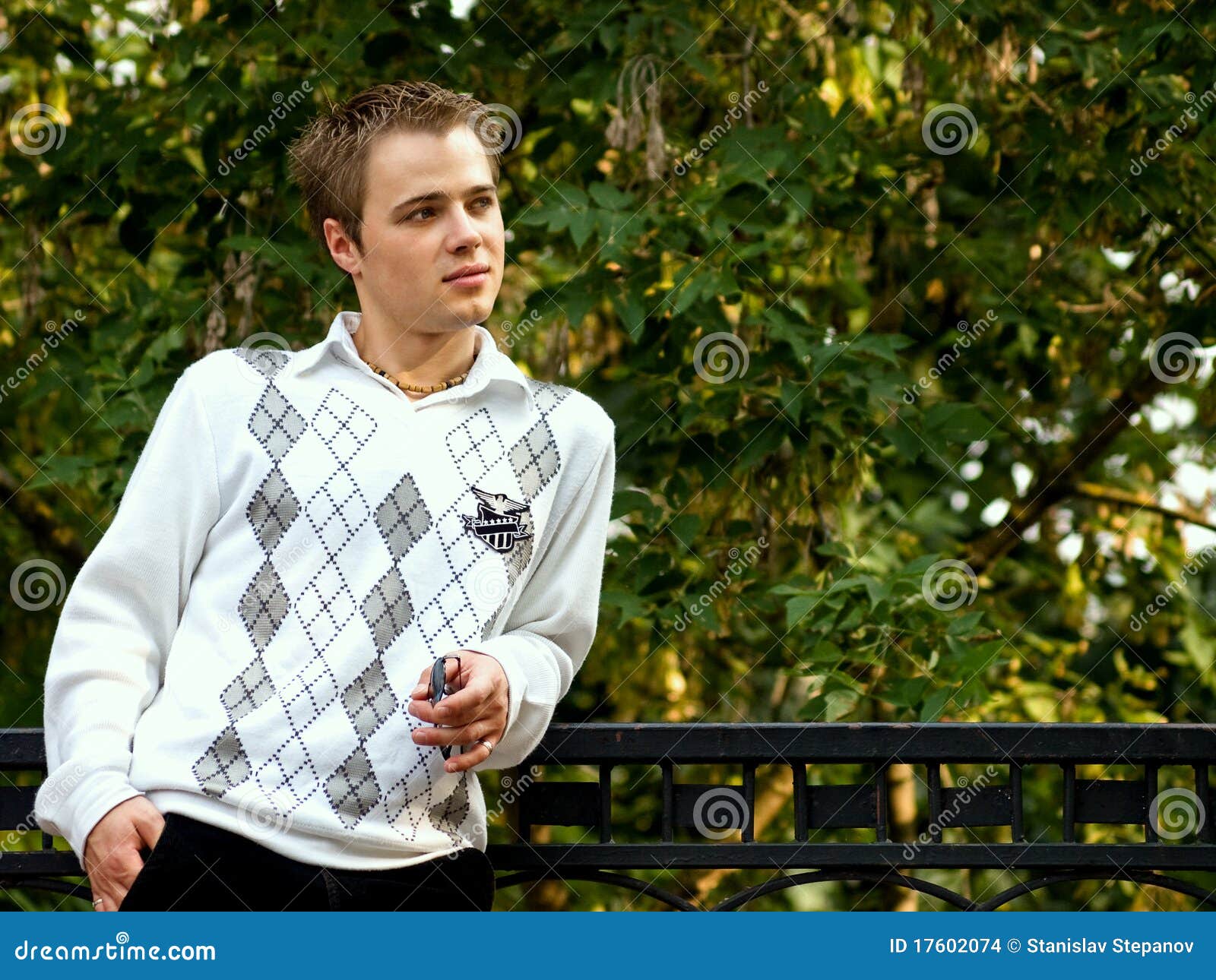Man leaned on barrier stock photo. Image of male, green - 17602074