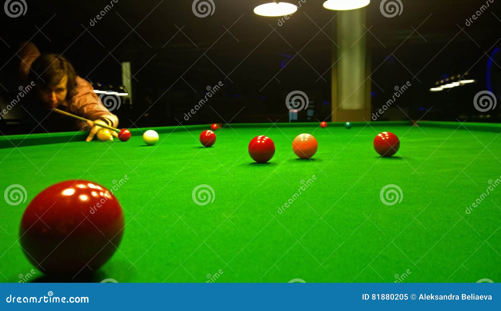 The Man Leaned Over the Table To Strike Stock Image - Image of colorful ...