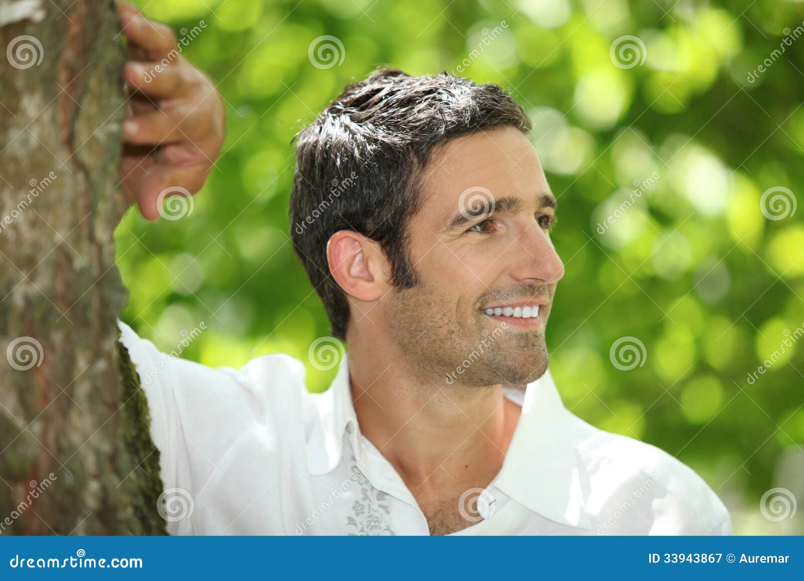 Man leaning against a tree stock image. Image of outside - 33943867