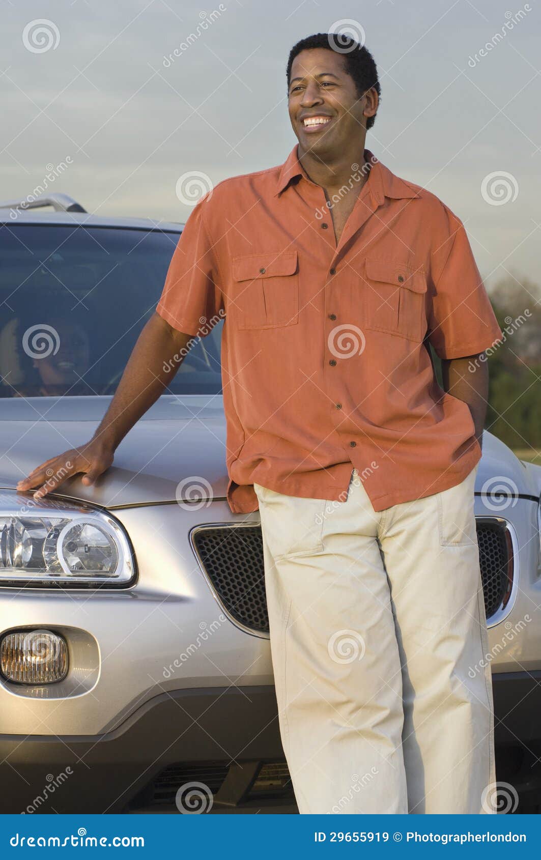 Man Leaning on Car stock image. Image of automobile, smile - 29655919