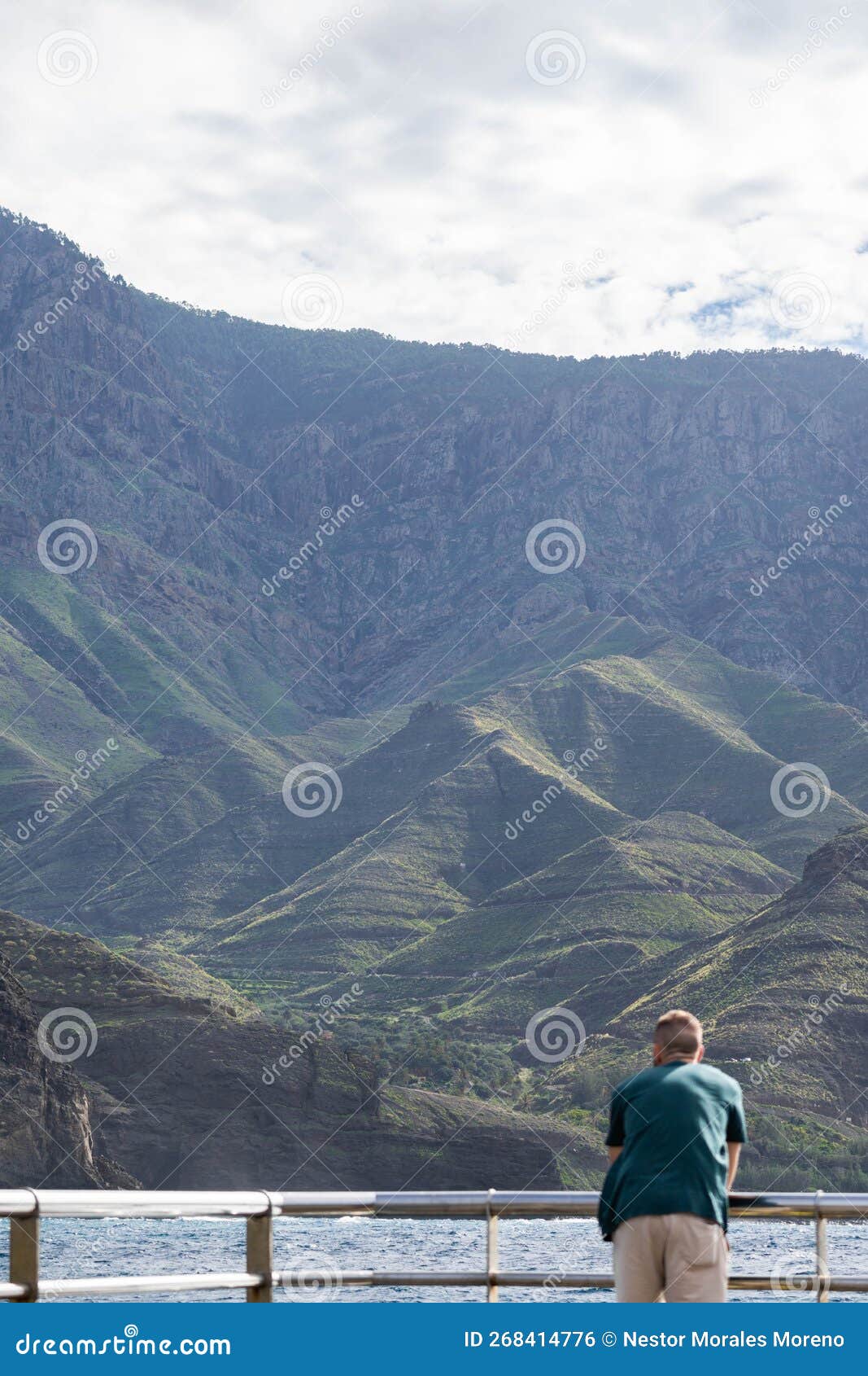 Man Leaning on a Handrail Gazing at the Sea Stock Photo - Image of ...