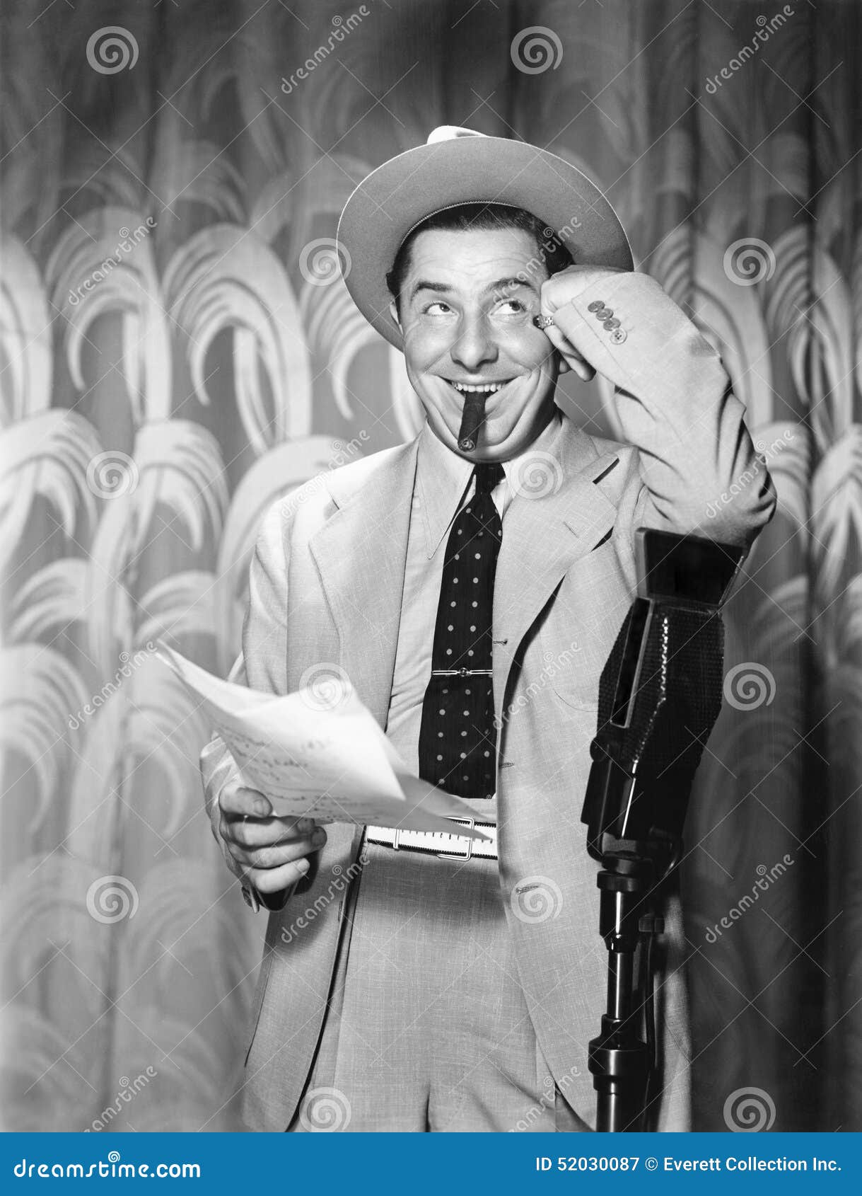 Man Leaning on a Microphone Looking into the Air Stock Image - Image of ...