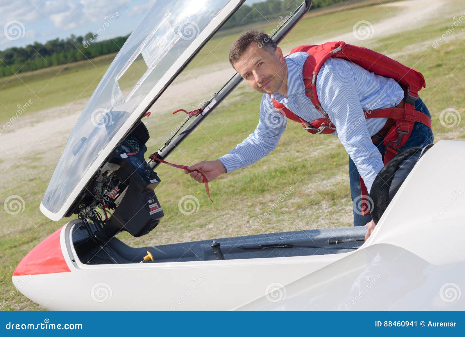 A Man Leaning On Glider Stock Photo | CartoonDealer.com #73276146