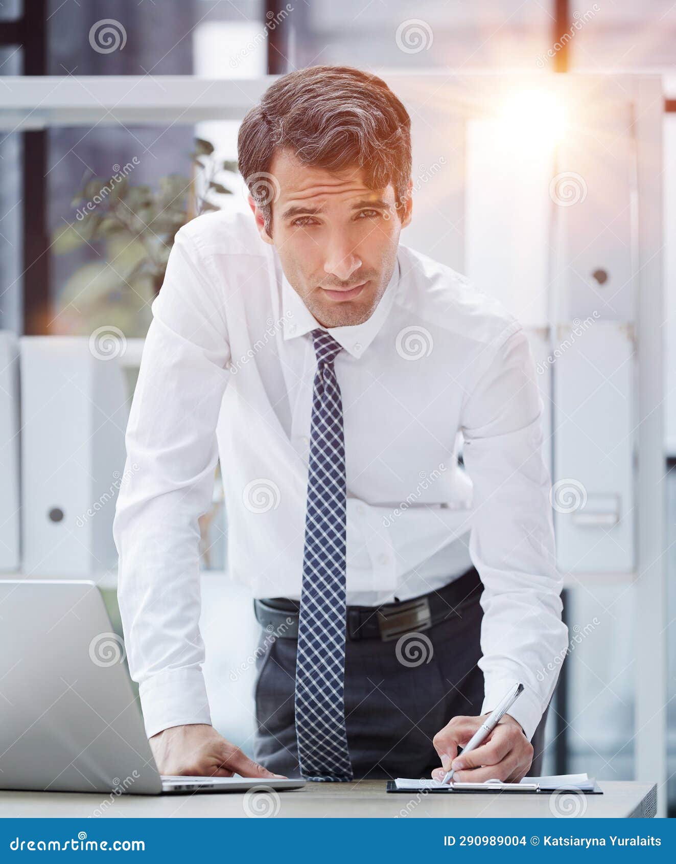 Man Leaning on the Table during a Phone Call Stock Photo - Image of ...